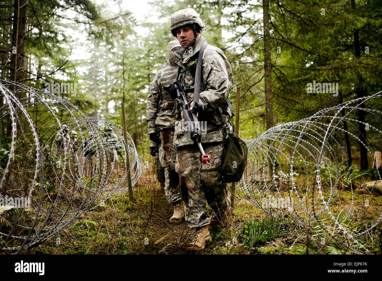 Capt. Kyle Peper, from Medical Company USA MEDDAC at Fort Irwin, guides ...
