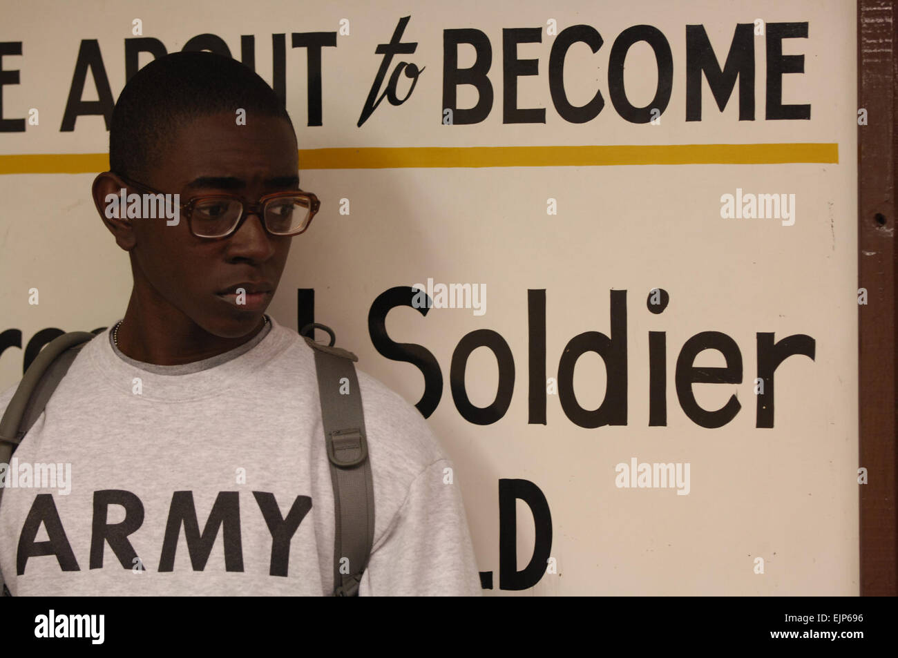 U.S. Army Pvt. Reginal Johnson waits in line to be issued his Army ...