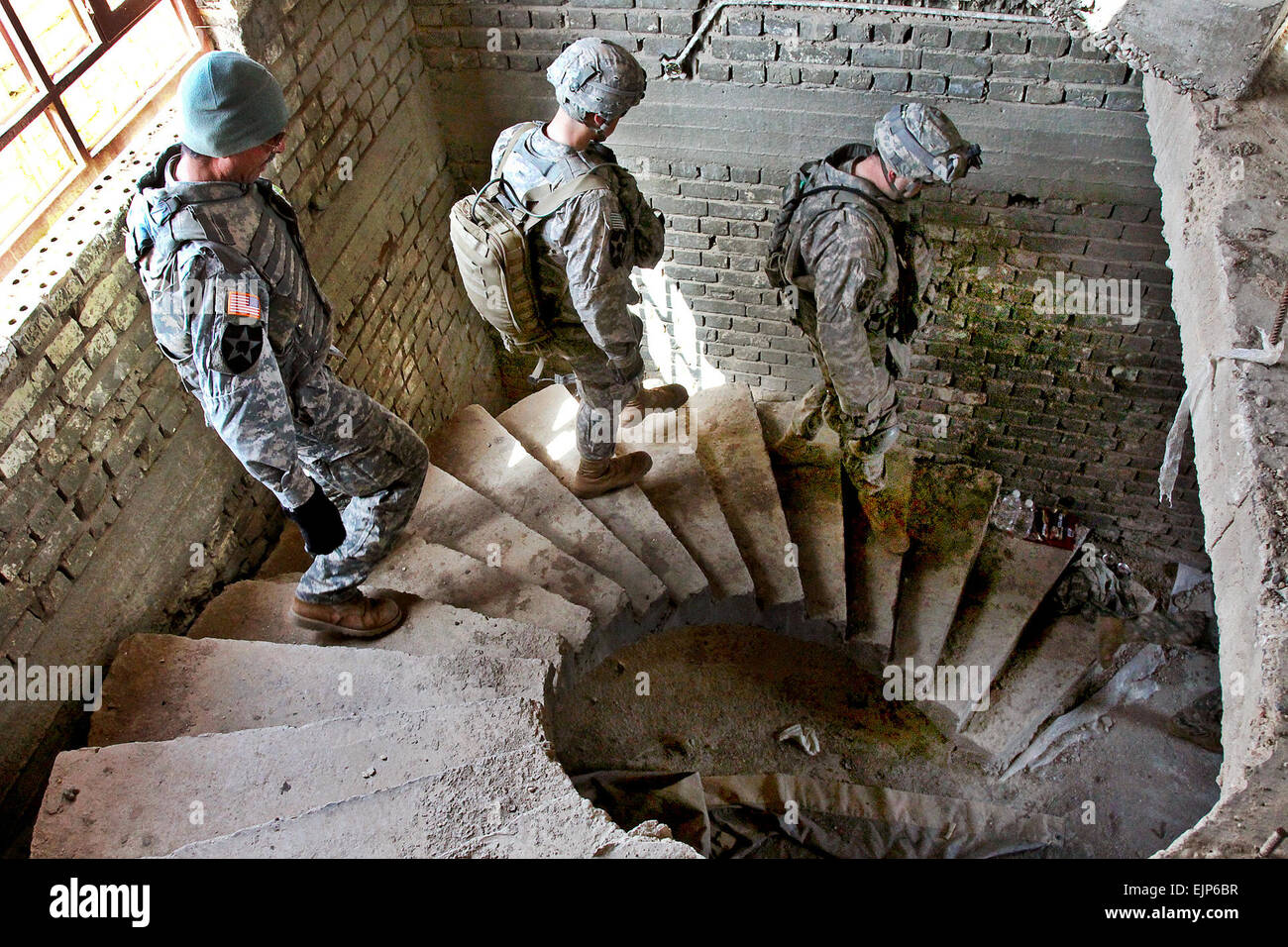 U.S. Army Soldiers leave an overwatch position in Taji, Iraq, March 7 ...