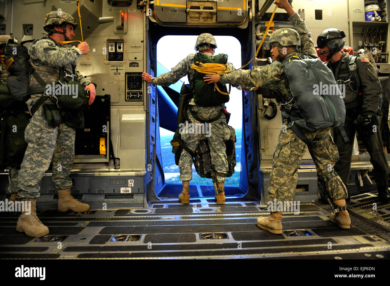 U.S. Army Soldiers prepare to conduct a static line airdrop during a ...