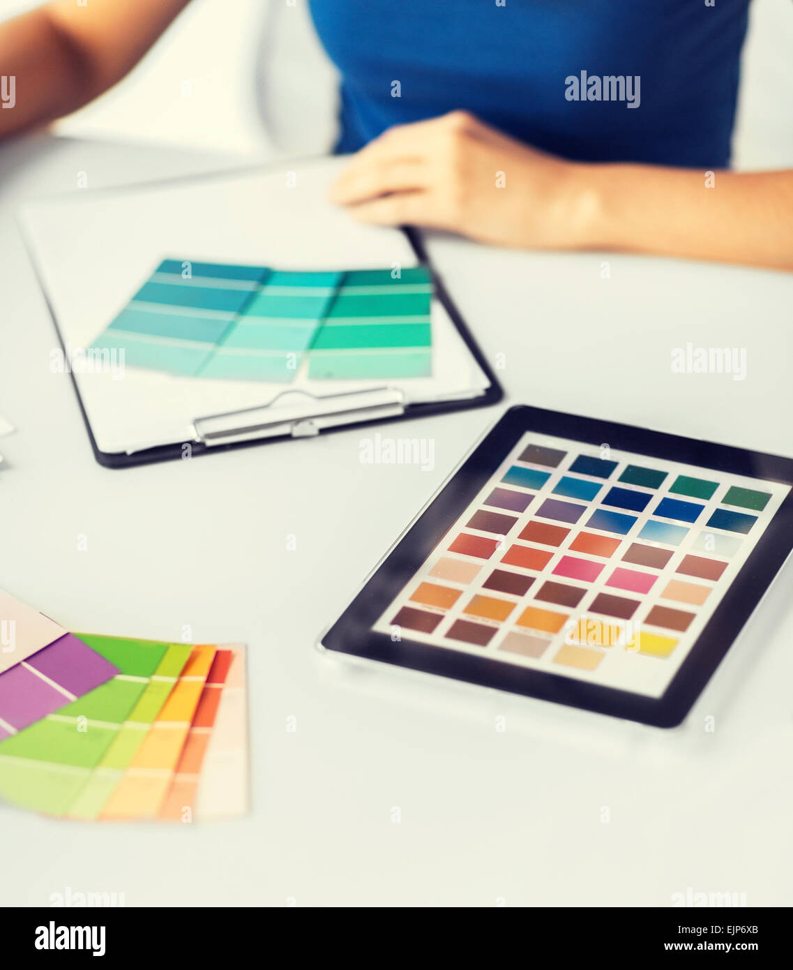 woman working with color samples for selection Stock Photo - Alamy