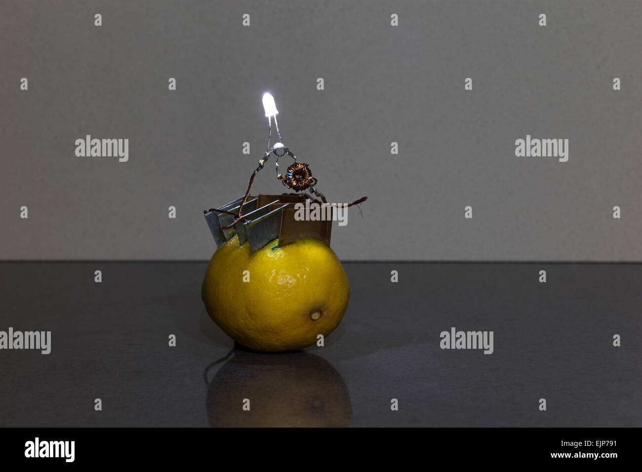 alternative energy source electrical current of lemon provides voltage ...