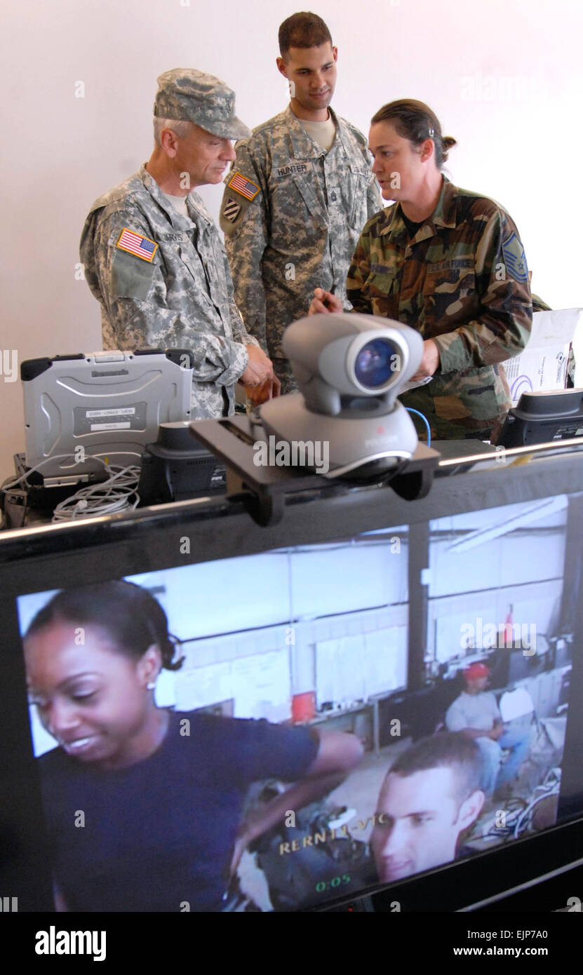 Members of the Florida Army and Air National Guard discuss the video ...