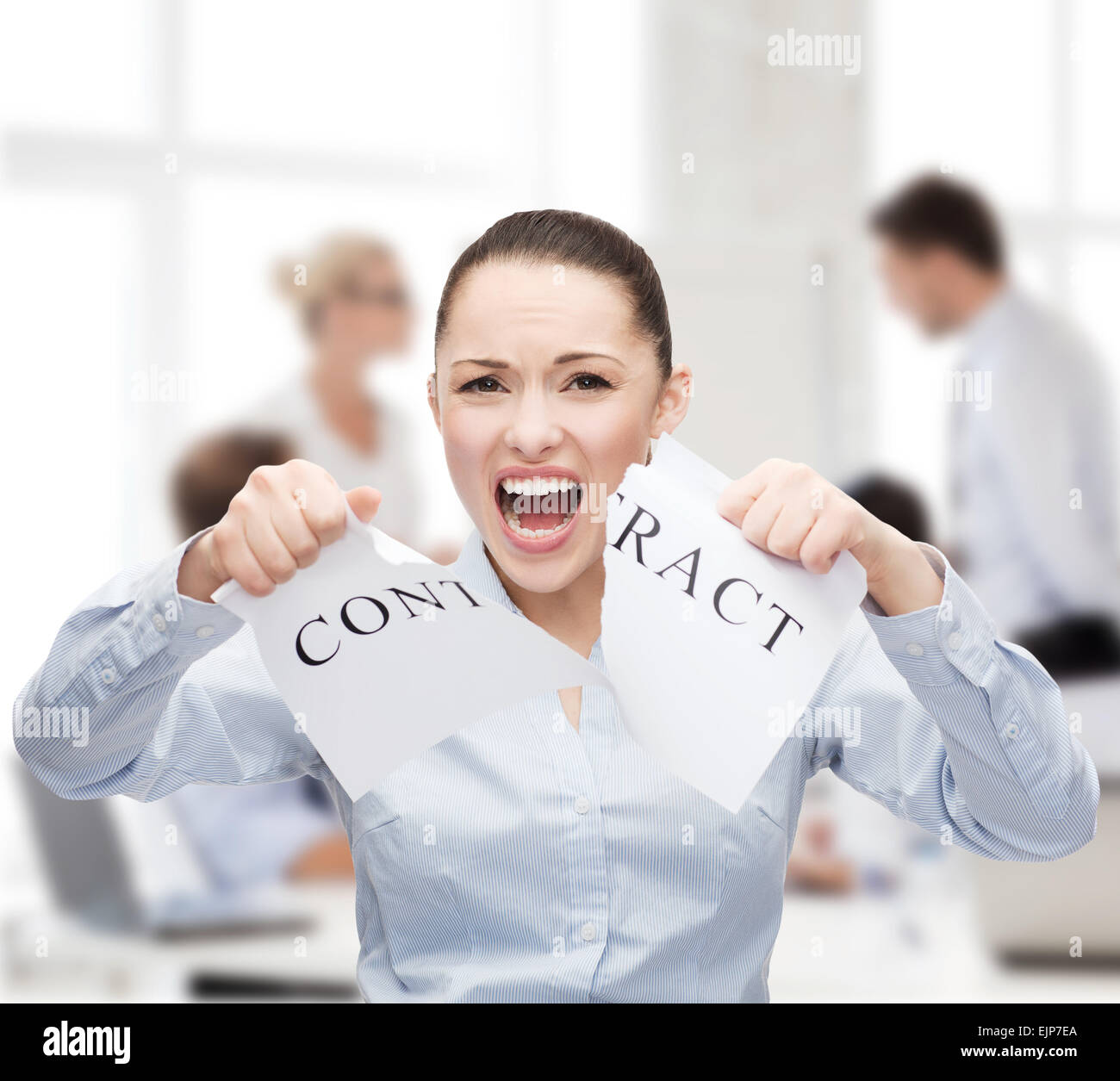 serious businesswoman tearing contract Stock Photo - Alamy