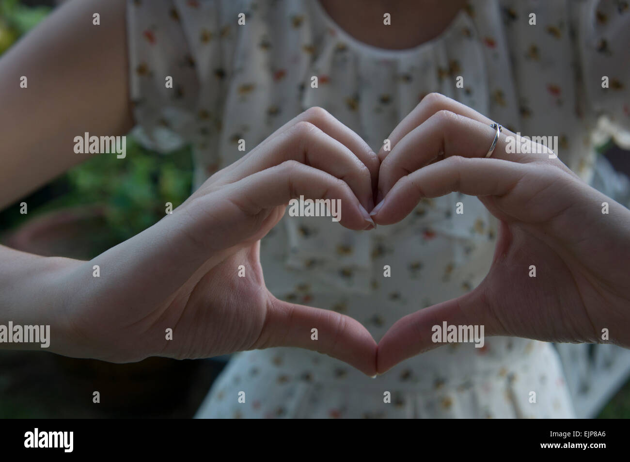love hand sign heart couple wife girlfriend Stock Photo - Alamy