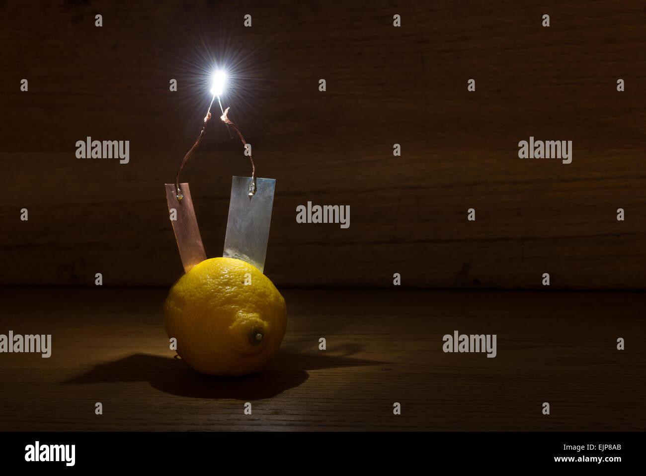 alternative energy source electrical current of lemon provides voltage ...