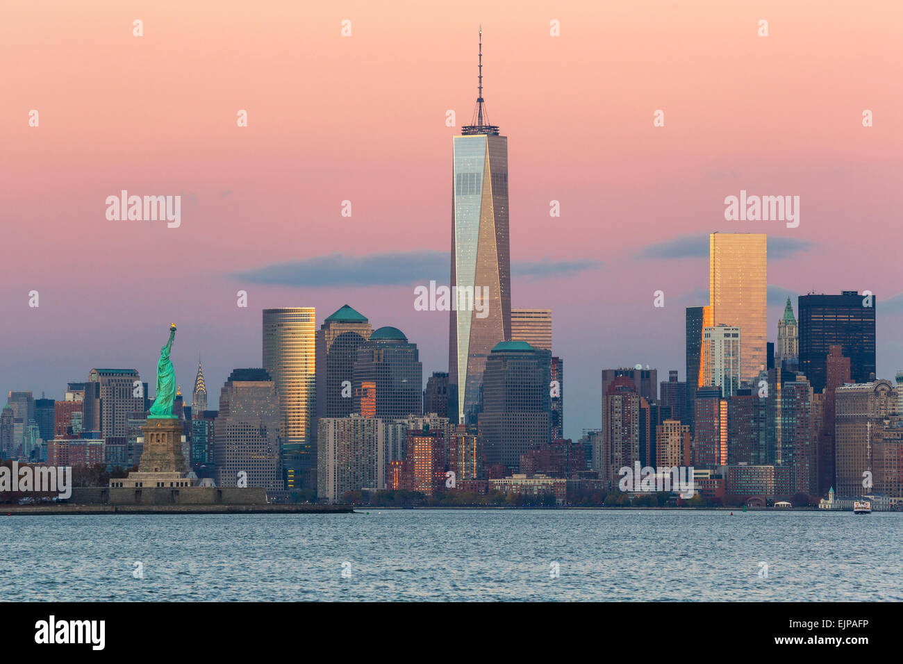 Statue of Liberty, One World Trade Center and Downtown Manhattan across ...
