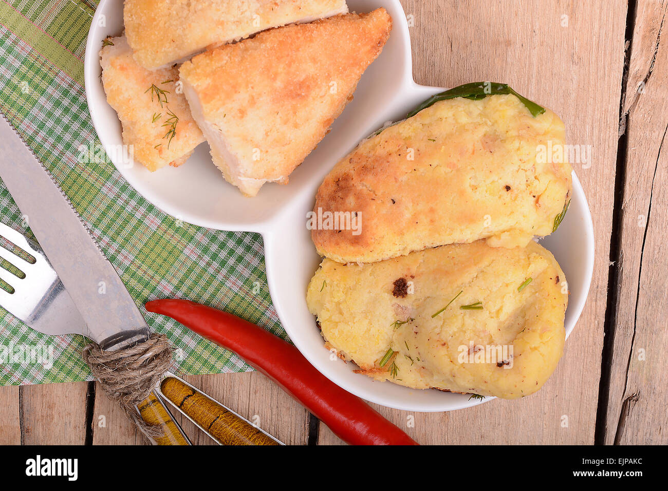 Fresh meat on white plate with red pepper Stock Photo - Alamy