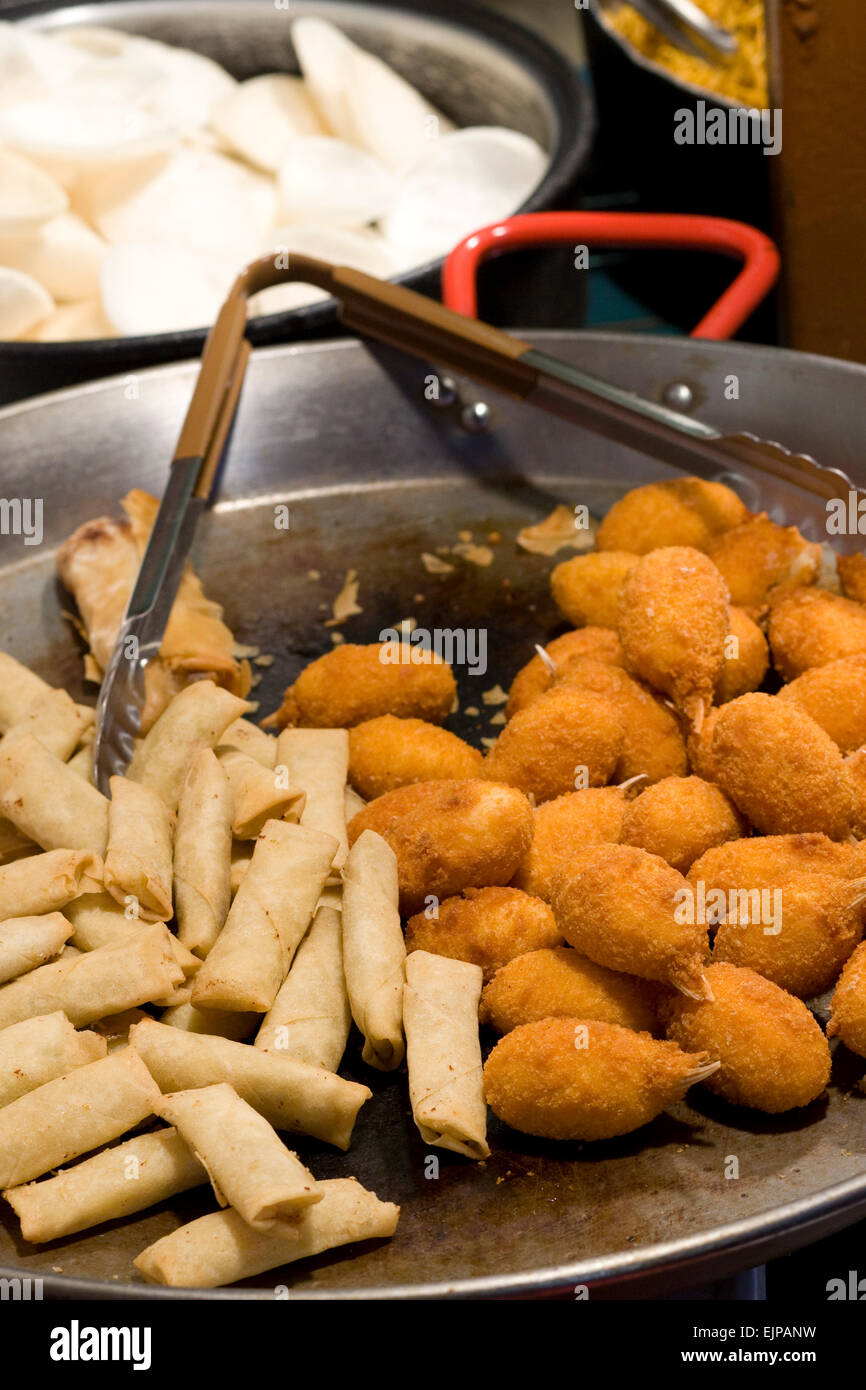 Chinese food cooking in Pans on a stall in Camden London Stock Photo ...