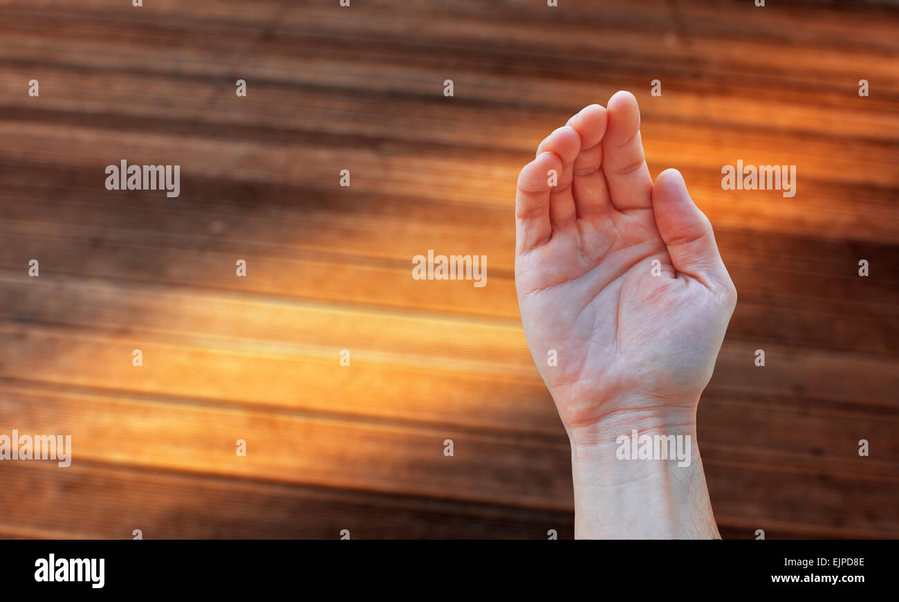 Open hand begging and blur background Stock Photo - Alamy