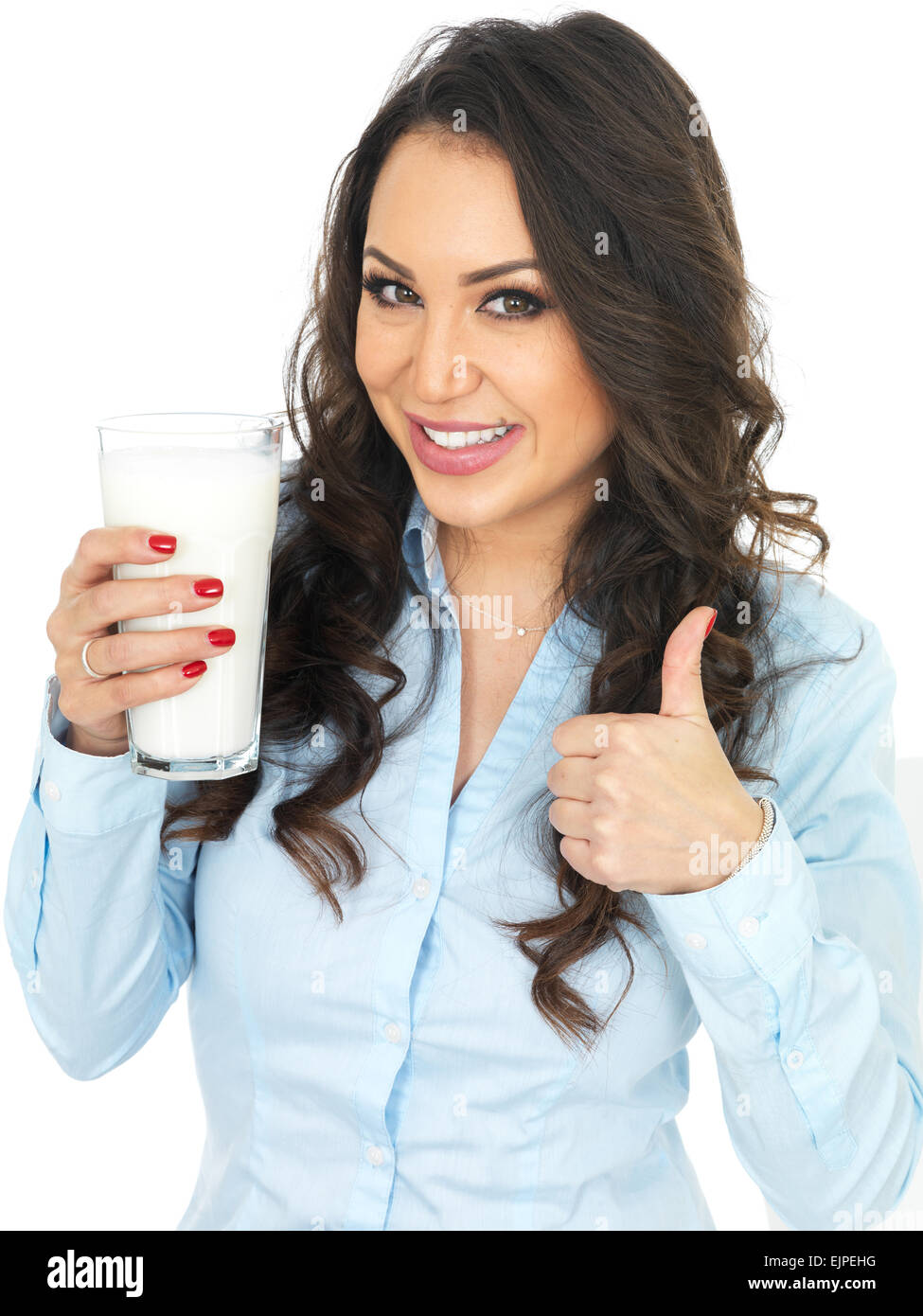 Attractive Young Woman Enjoying a Glass of Fresh Milk Stock Photo - Alamy