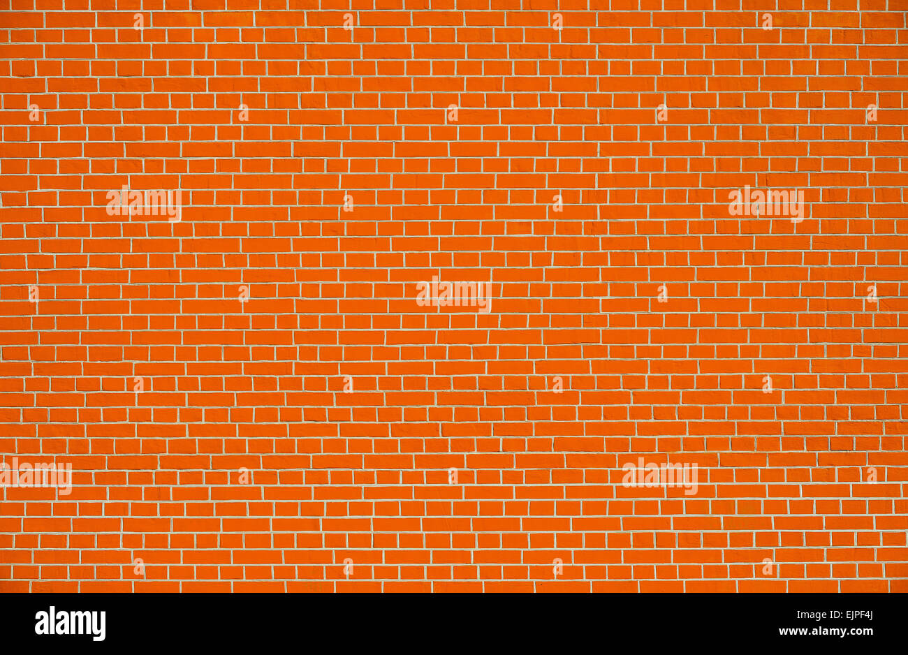 Red brick wall background on sunny summer day Stock Photo - Alamy