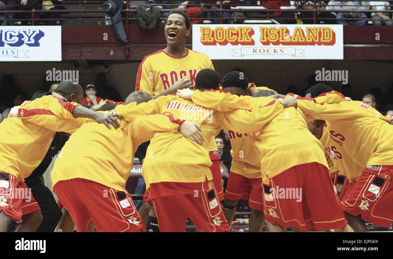 Moline, Iowa, USA. 11th Feb, 2011. Rock Island's Denzel McCauley leads ...