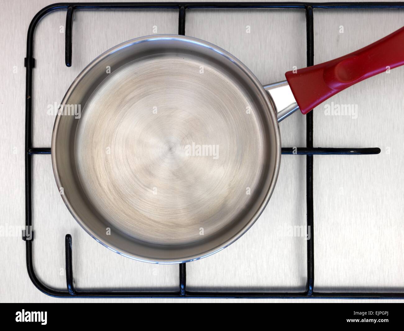 A cooking pot isolated on a stove top Stock Photo - Alamy