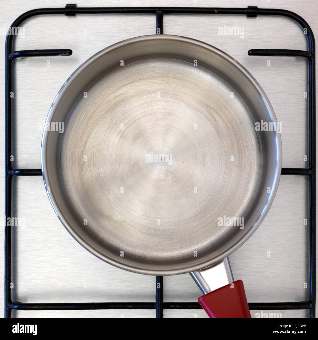A cooking pot isolated on a stove top Stock Photo - Alamy