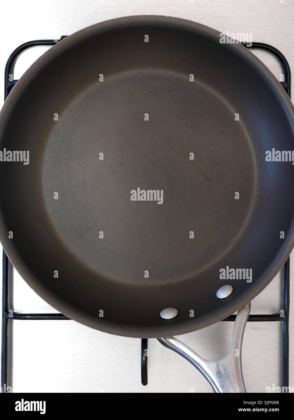 A cooking pot isolated on a stove top Stock Photo - Alamy