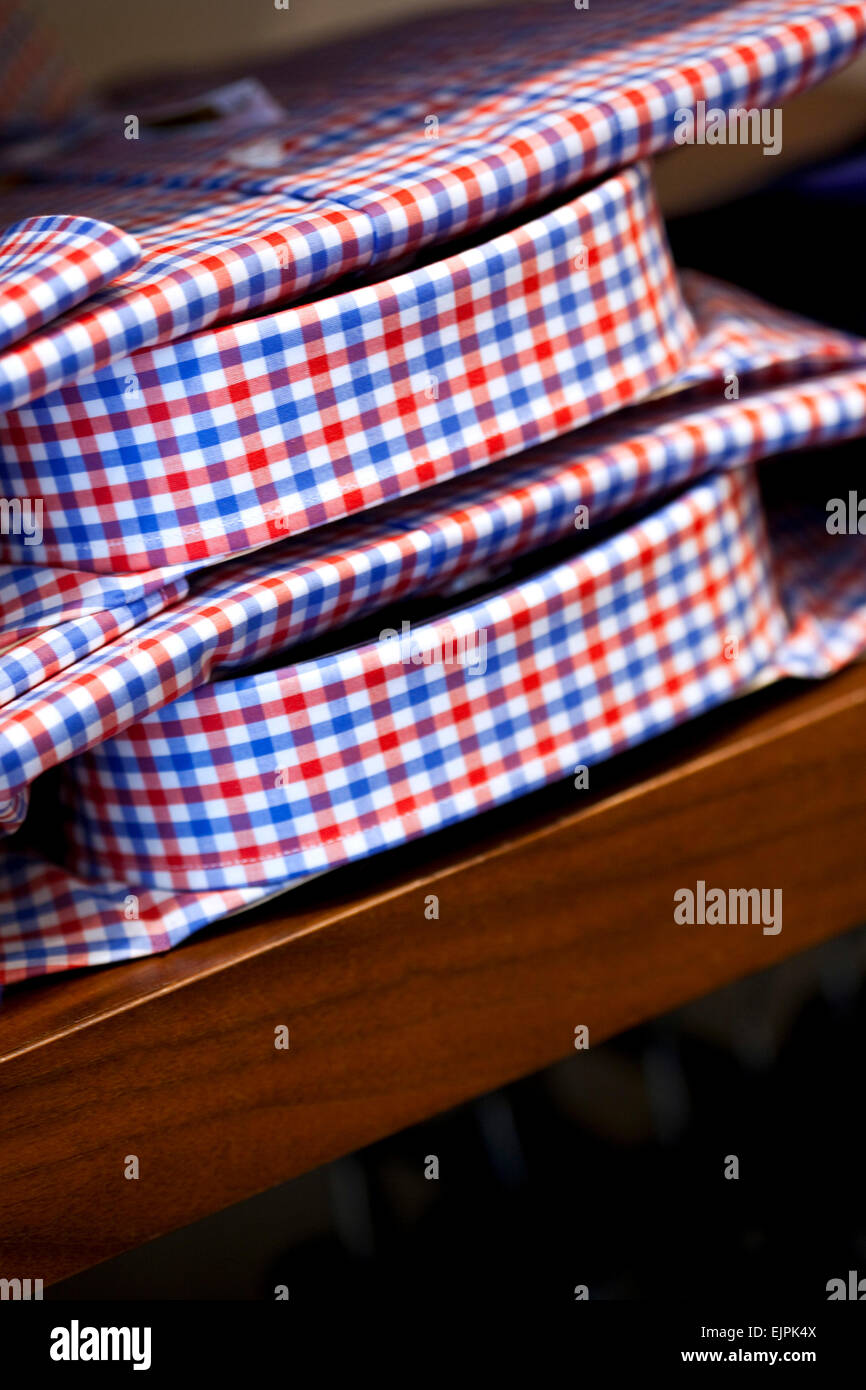 Shirts on a shelf hi-res stock photography and images - Alamy