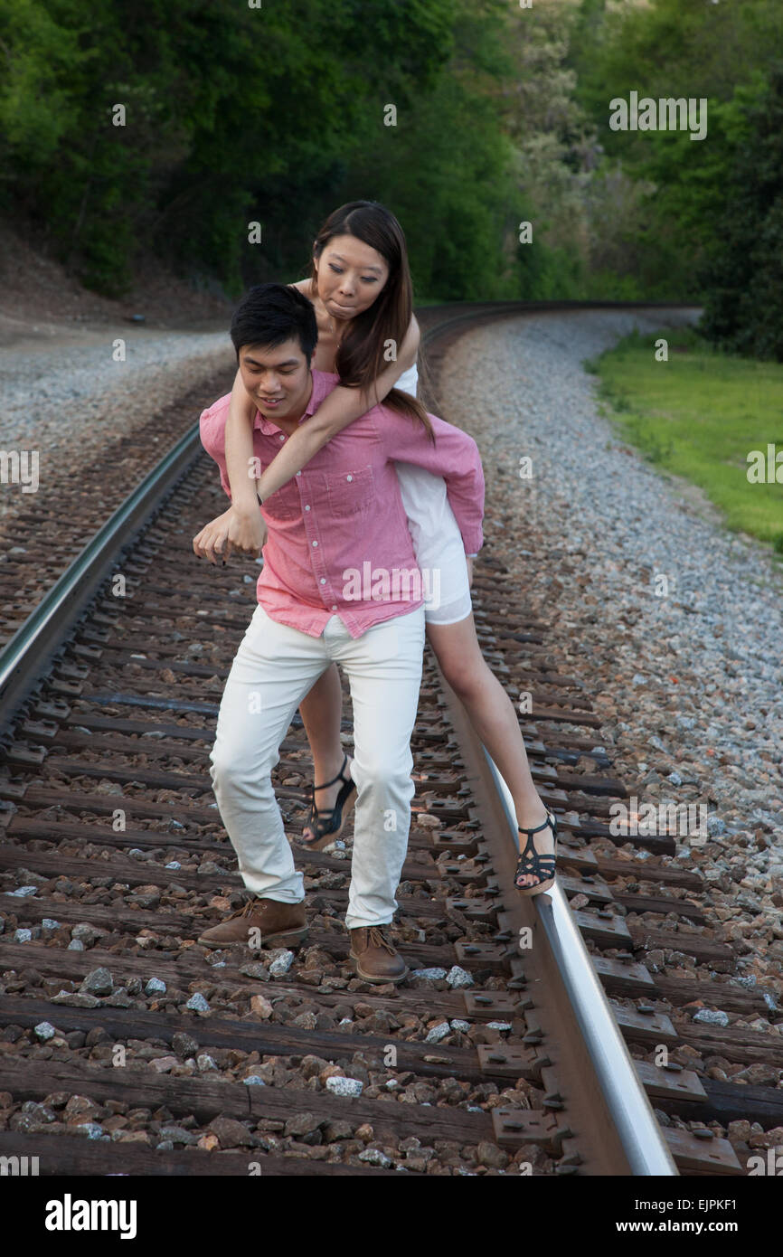 Riding piggy back piggyback hi-res stock photography and images - Alamy