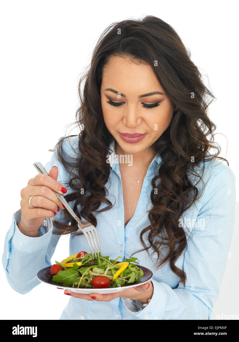 Attractive Young Woman Eating a Salad Stock Photo - Alamy