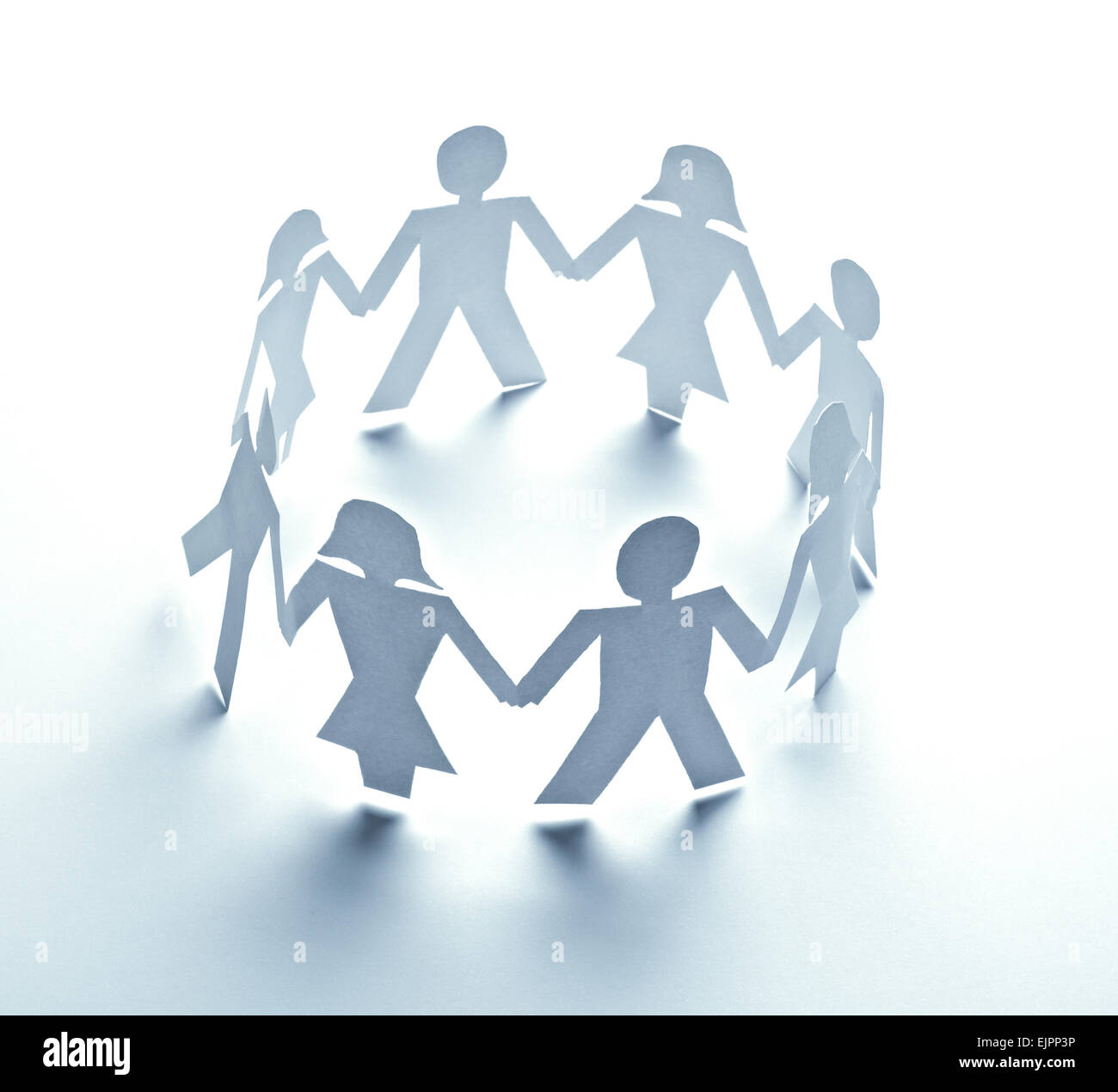 close up of paper people on white background Stock Photo - Alamy