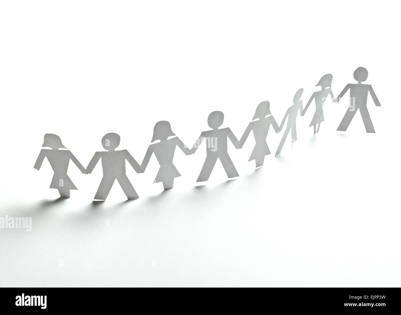 close up of paper people on white background Stock Photo - Alamy