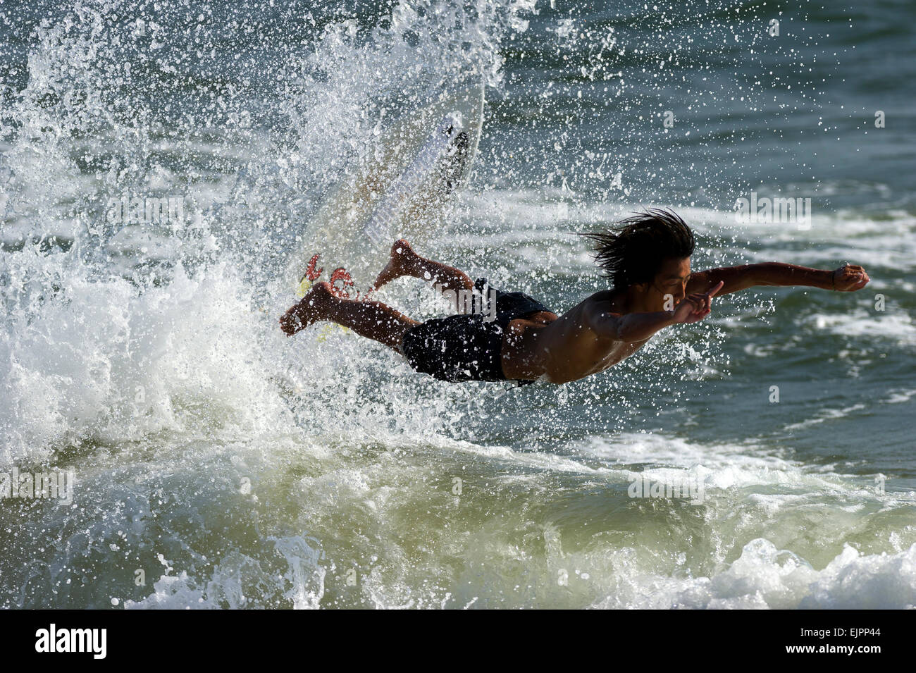 Surfer falling hi-res stock photography and images - Alamy
