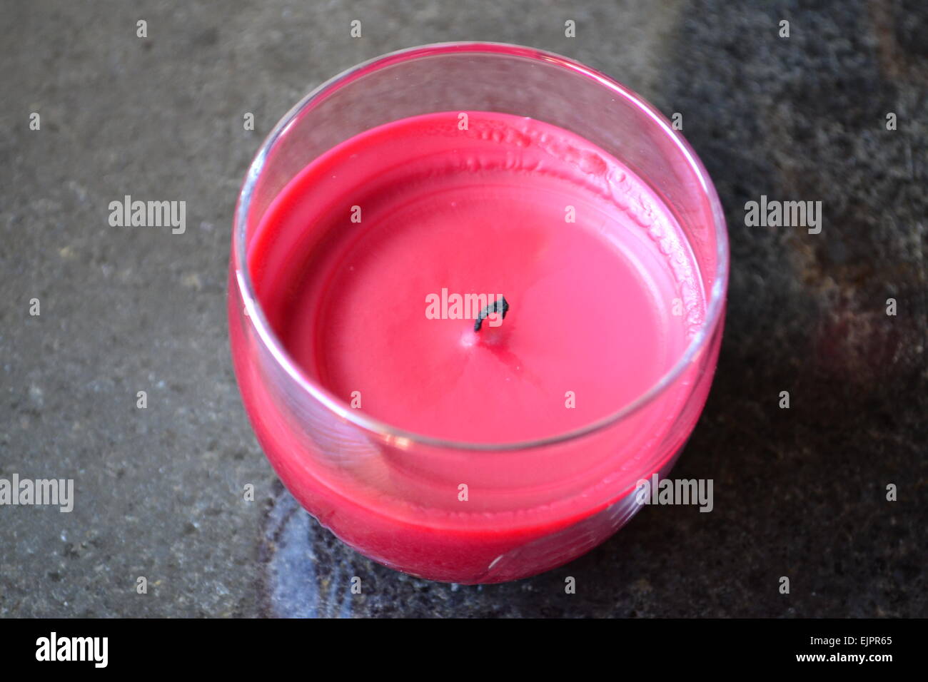 Single Scented Candle Stock Photo - Alamy