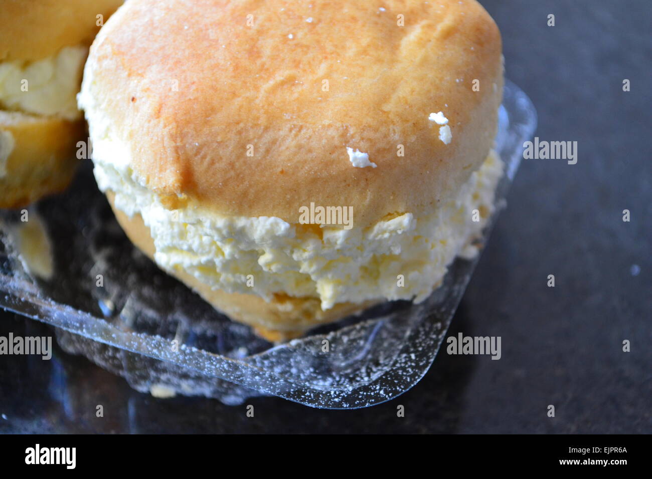 Two cream buns hi-res stock photography and images - Alamy