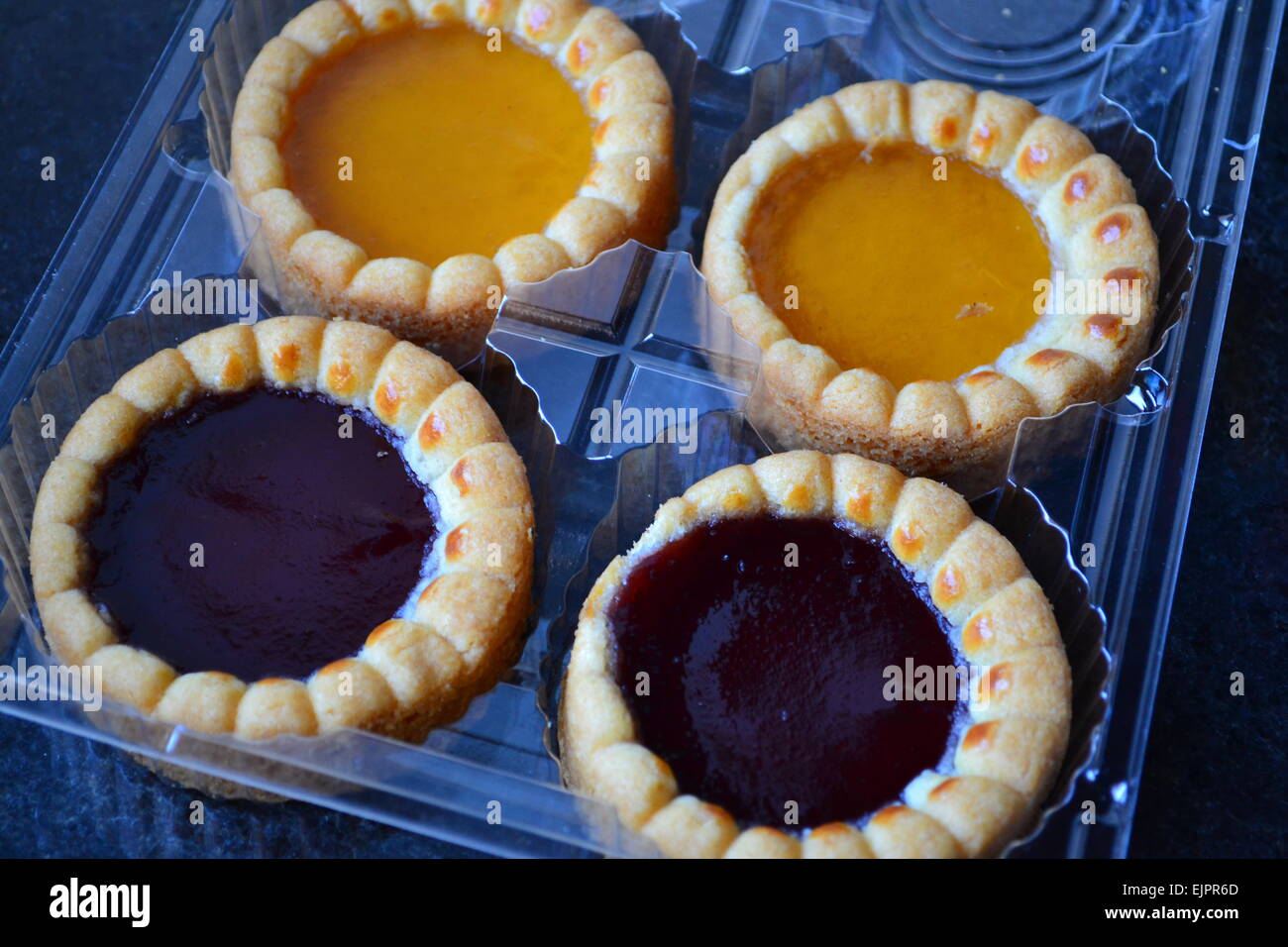 Four Baked Tarts Stock Photo - Alamy