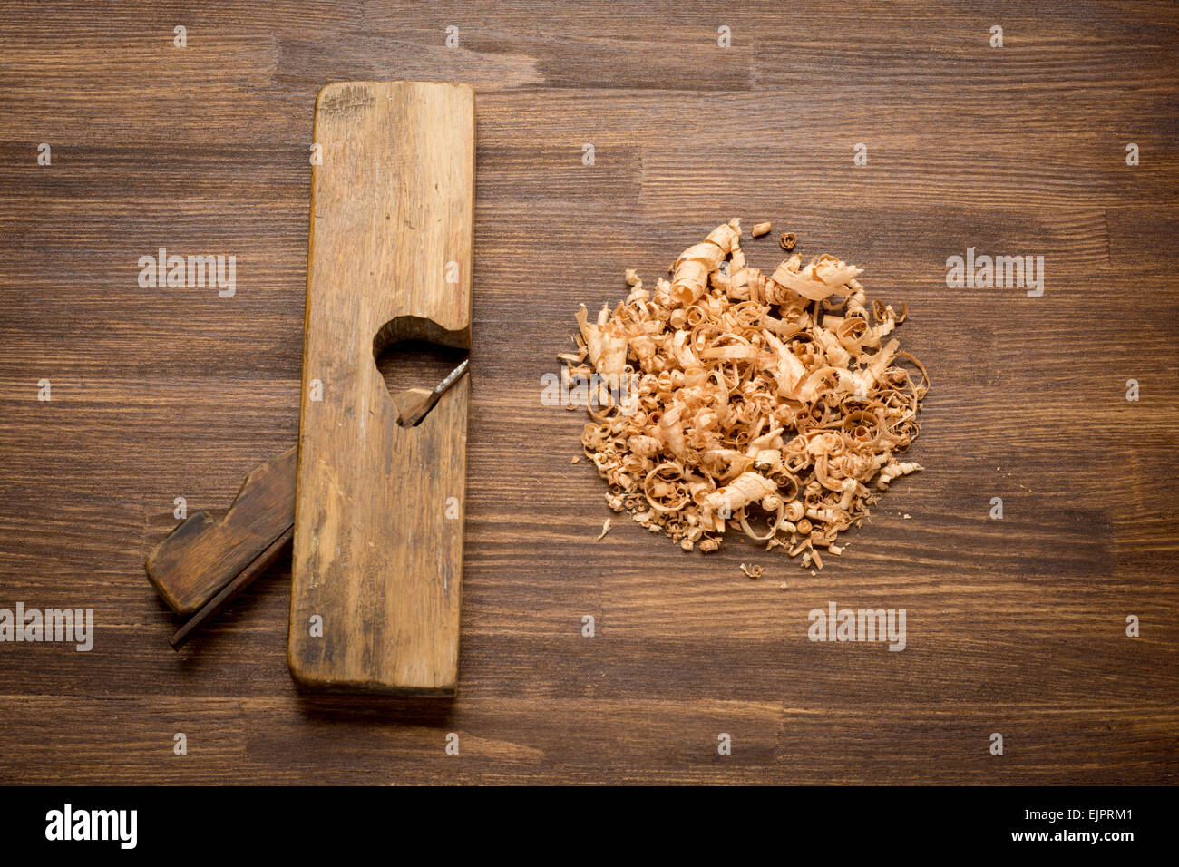 Old vintage carpenter jointer tool on wooden table Stock Photo - Alamy