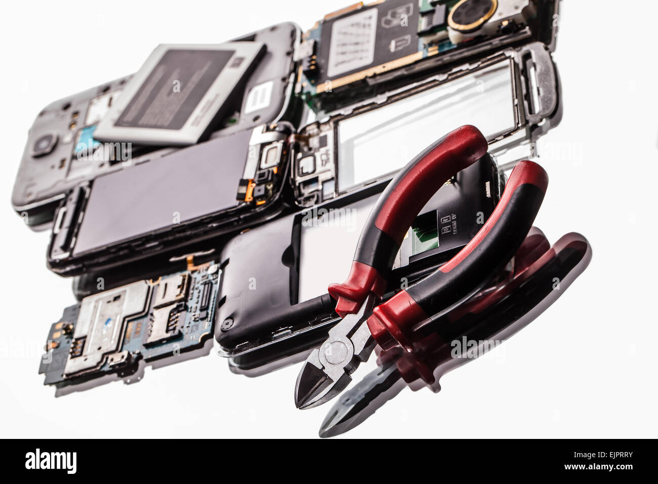 broken phones and clippers closeup on a light background Stock Photo ...