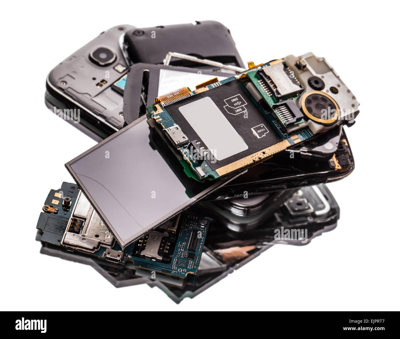 many broken phones closeup on a light background Stock Photo - Alamy