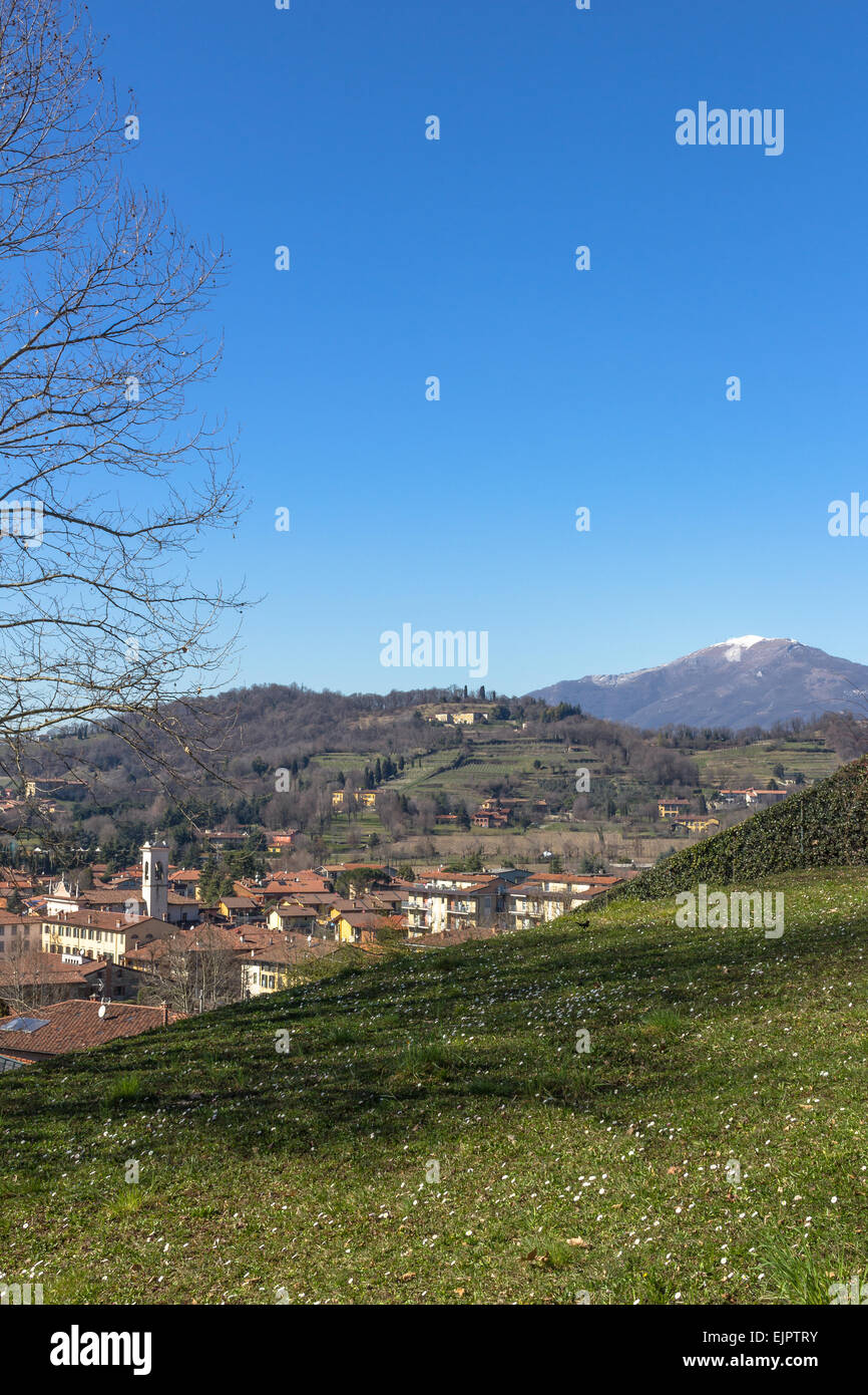 Countryside landscape with a small village in the distance Stock Photo ...