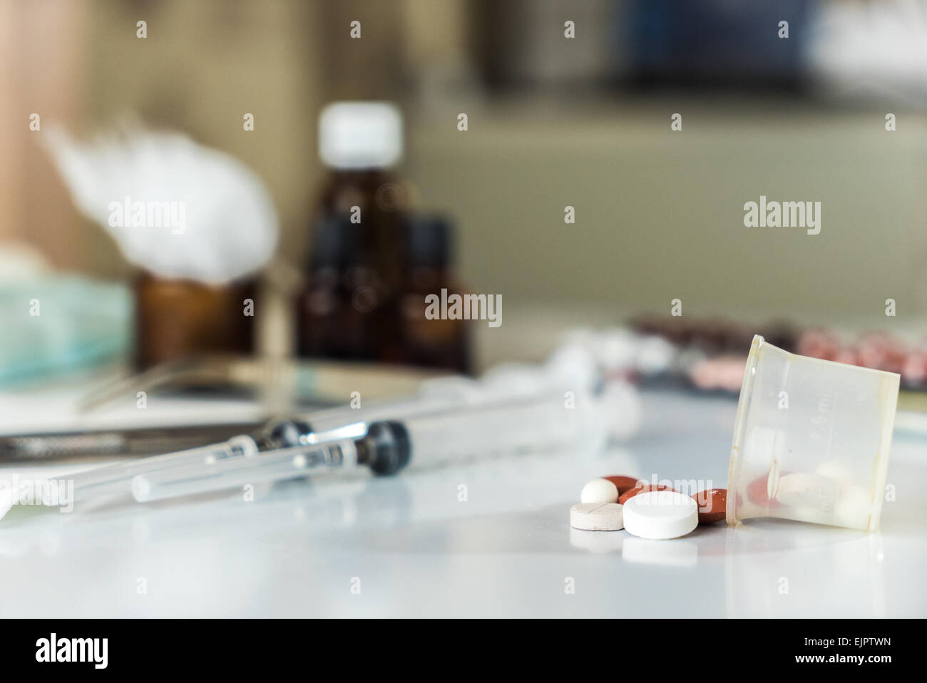 Drugs in a measuring cylinder Stock Photo - Alamy