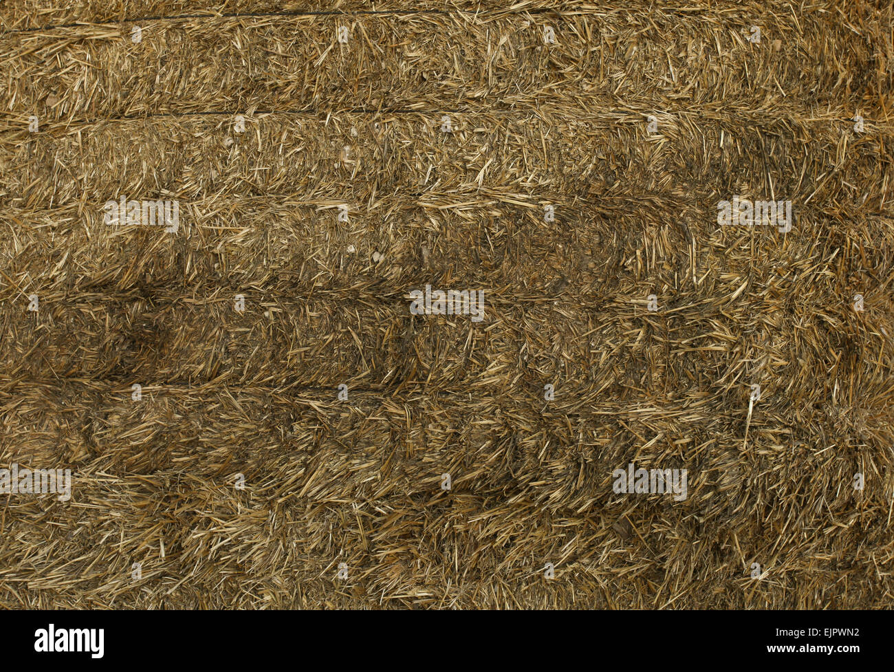 Hay bale background Stock Photo - Alamy