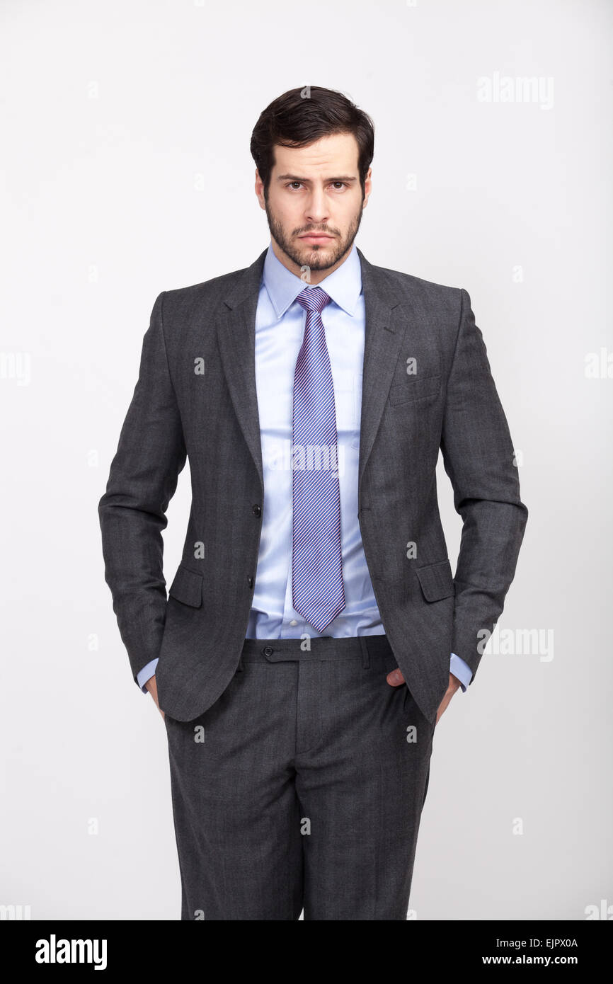 elegant businessman wearing grey suit and tie with beard, isolated ...