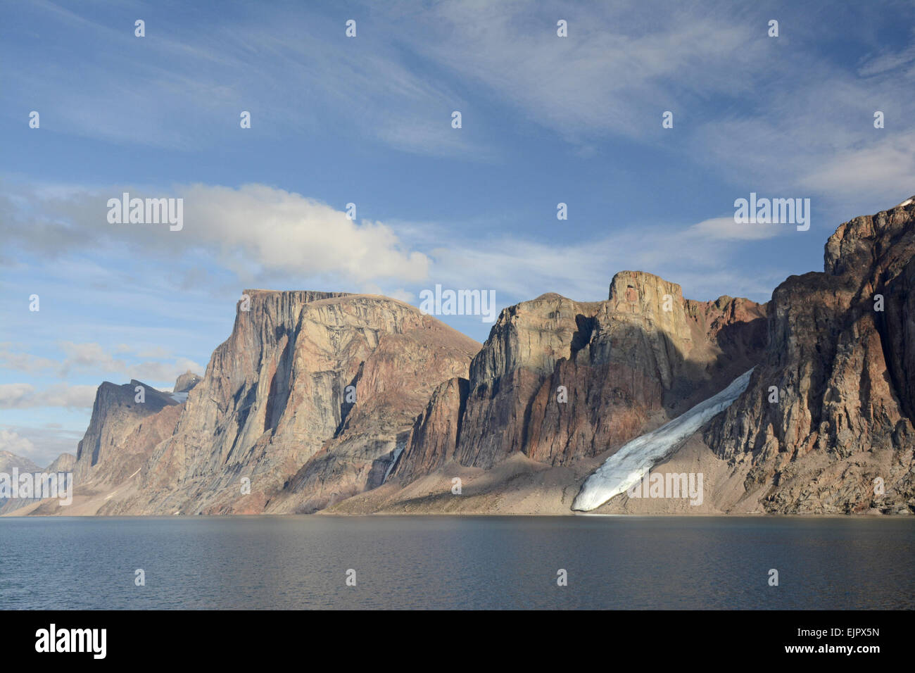 View of coastline with mountains and glacier, Baffin island, Nunavut ...