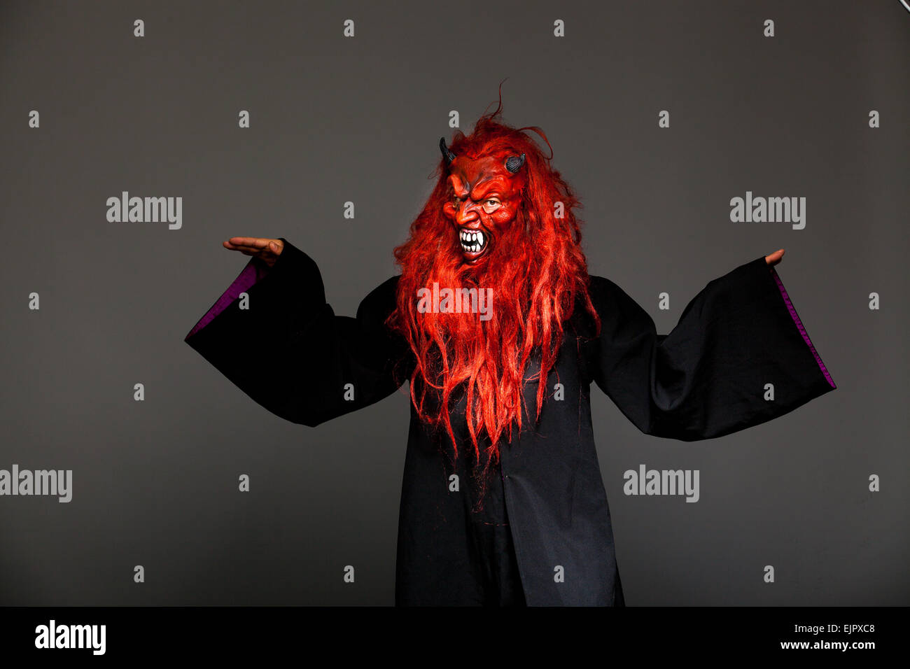 halloween monster with red face on dark background Stock Photo - Alamy