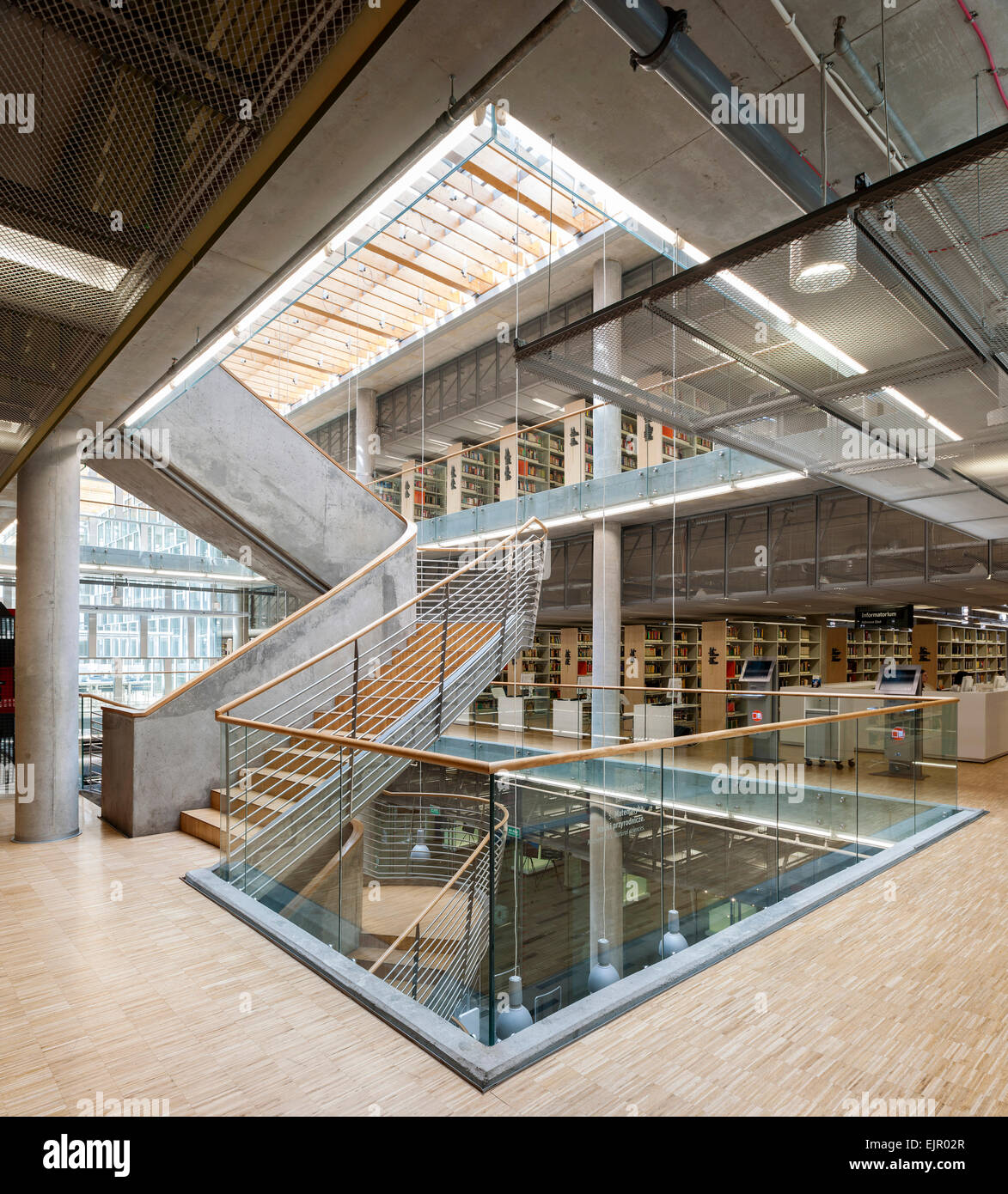 Detail view showing concrete column, staircase fluorescent lights ...