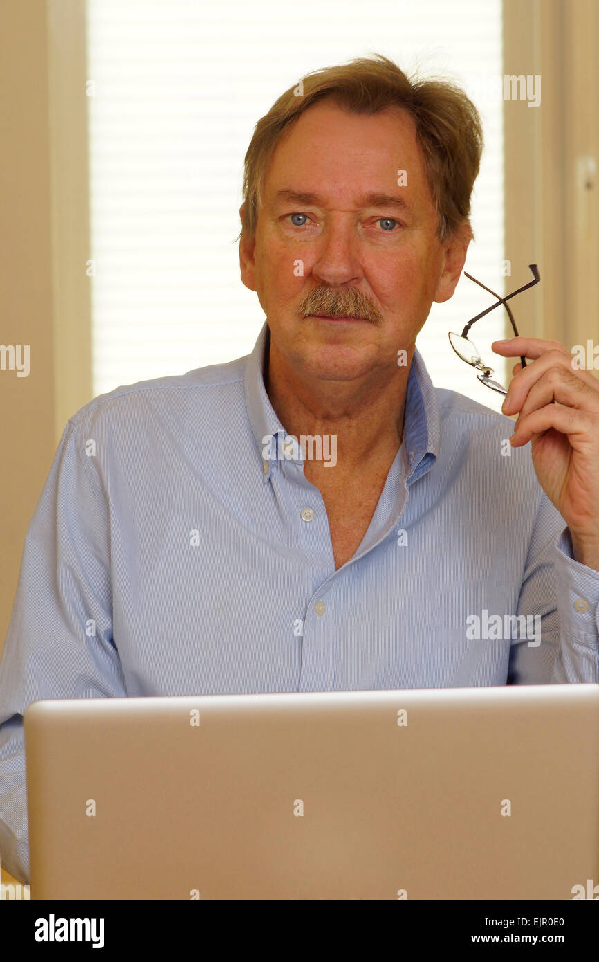 Old man work with a computer Stock Photo - Alamy