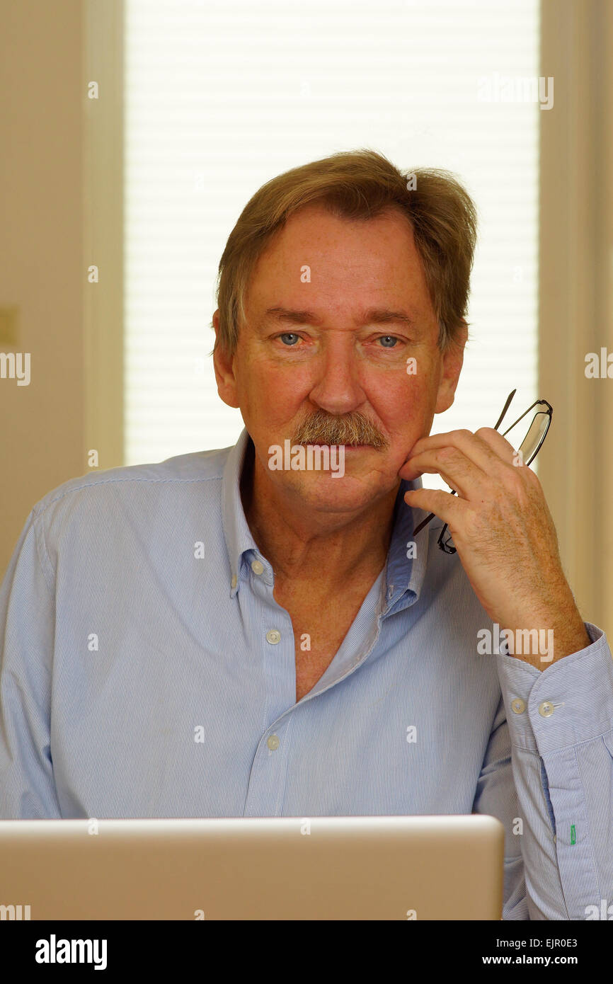 Old man work with a computer Stock Photo - Alamy