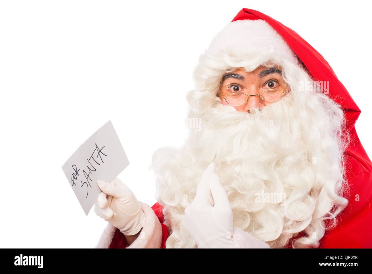 santa claus holding letters from kids on white background Stock Photo ...