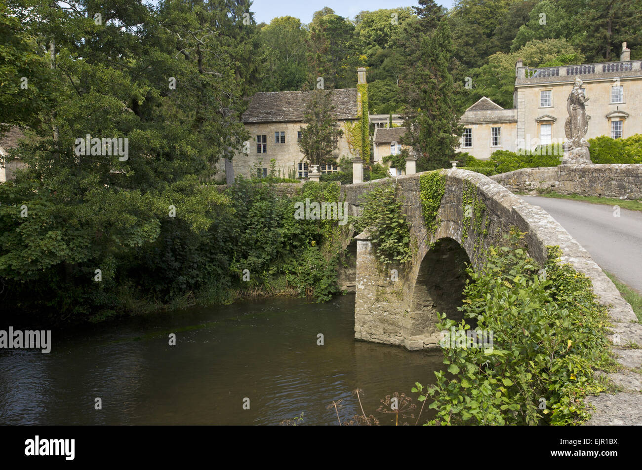 View of river and old bridge near manor house, Iford Manor, River Frome ...
