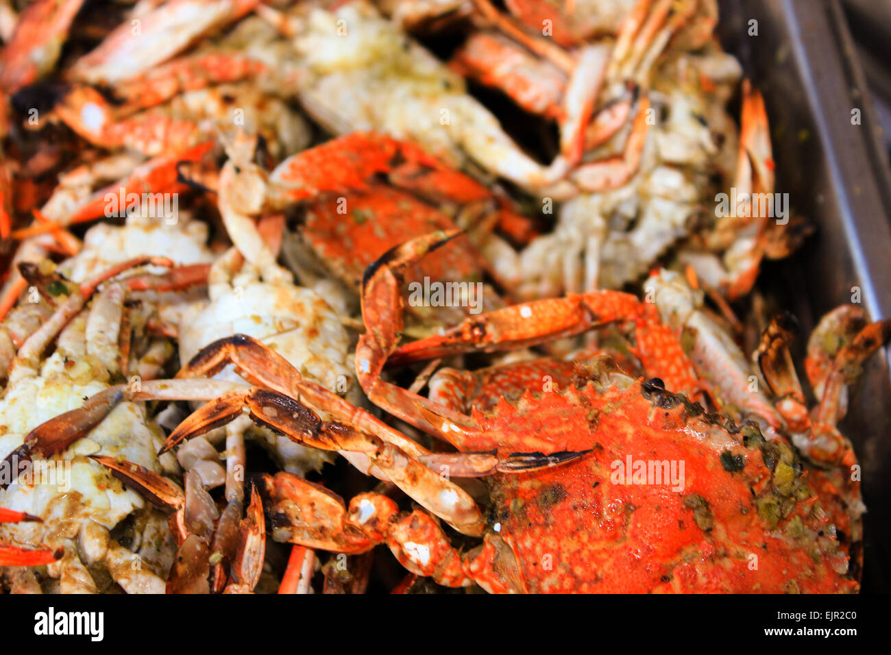 Grilled crab on flaming grill. Charcoal fire grill. Barbecue embers ...