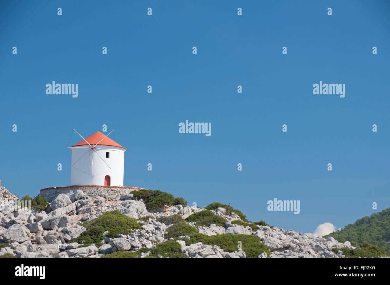 Traditional Greek Windmill overlooking Panormitis Monastery on the ...