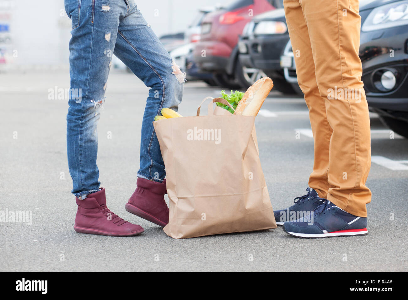 Couples foot and shopping bag with food Stock Photo - Alamy
