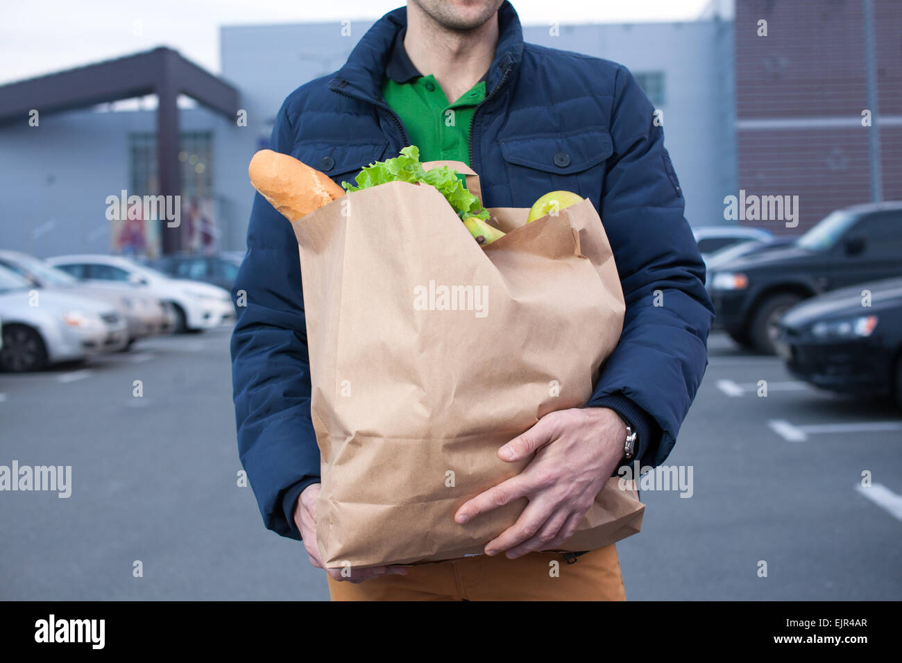 Man Carrying A Bag High Resolution Stock Photography and Images - Alamy