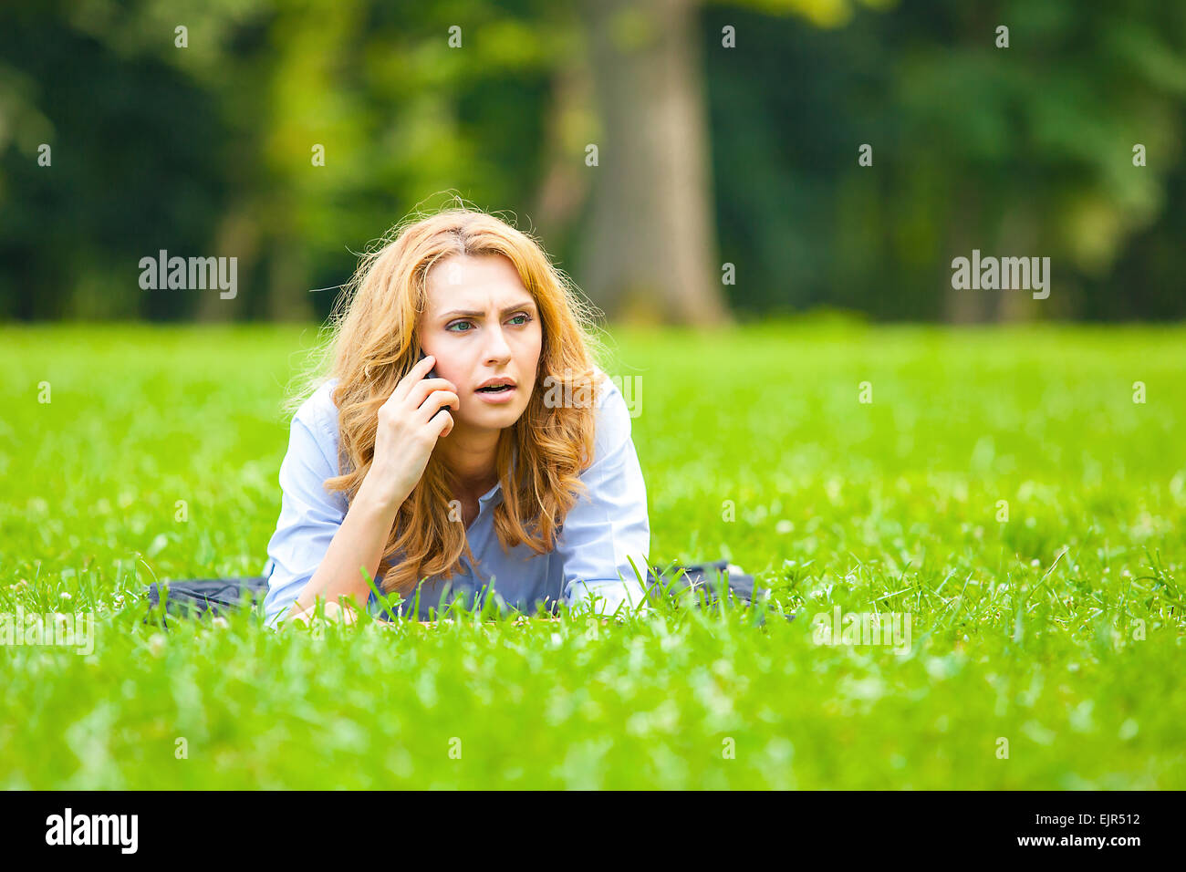 Lady in grass hi-res stock photography and images - Alamy