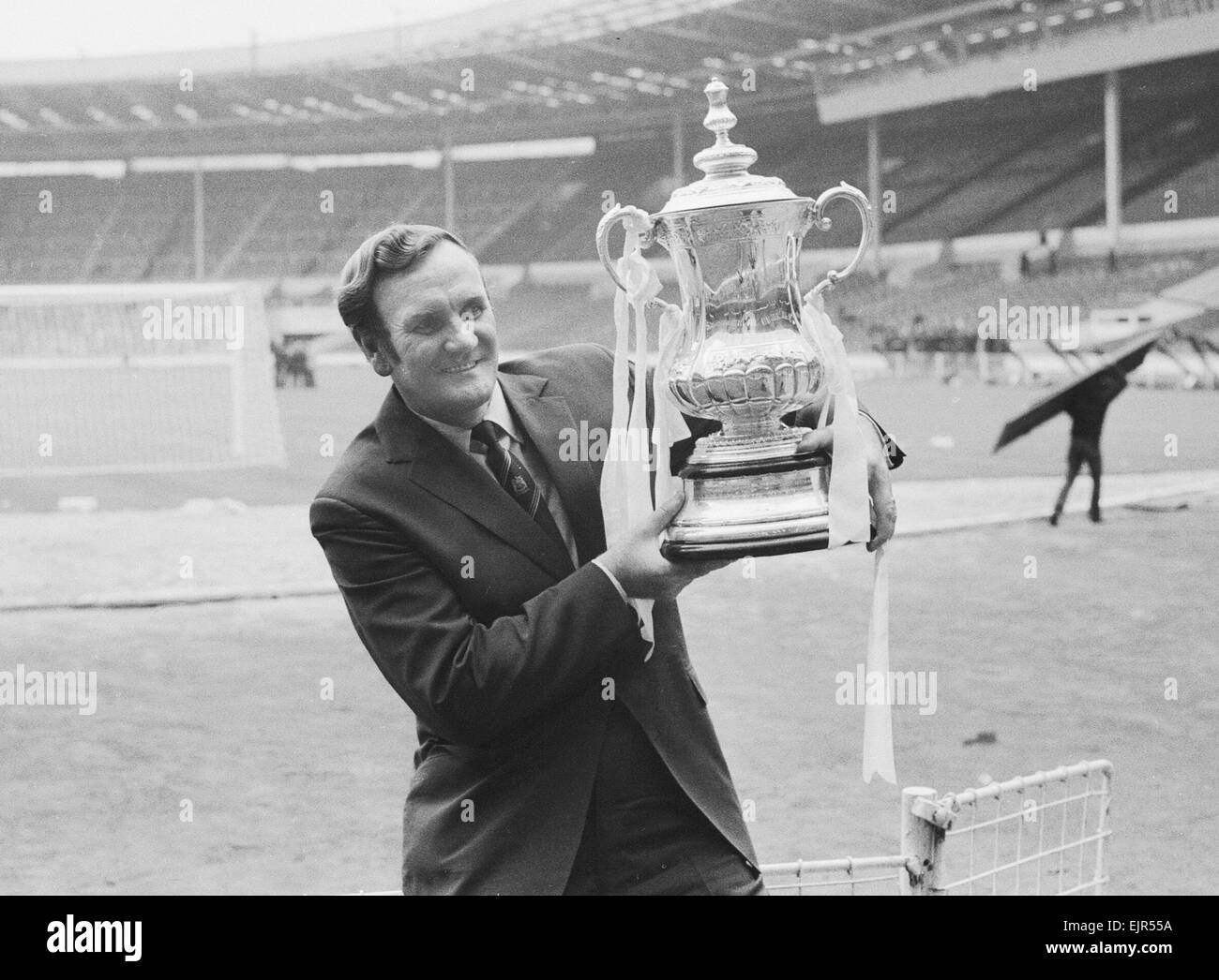 Leeds Manager Don Revie seen here in a deserted Wembley holding the F.A ...