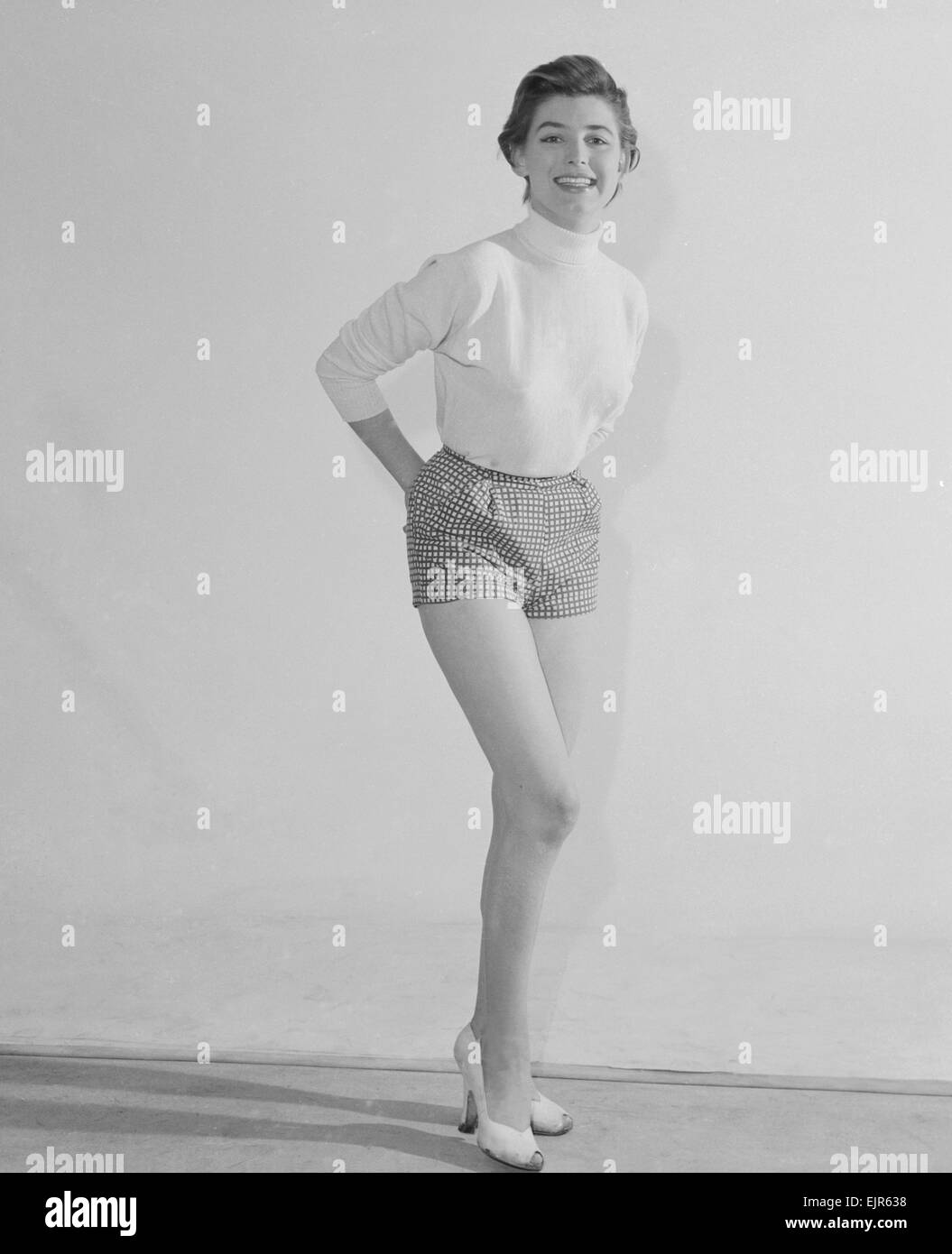 Model Vicki Martin seen here modelling a turtle neck jumper and shorts ...